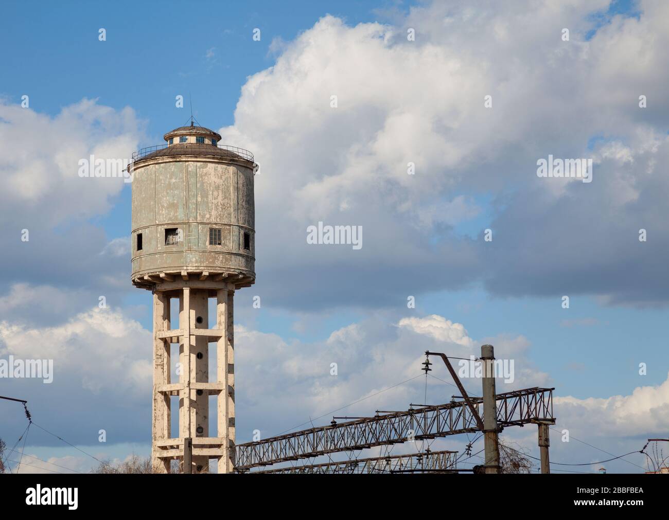 Water tower against the sky with clouds Stock Photo - Alamy