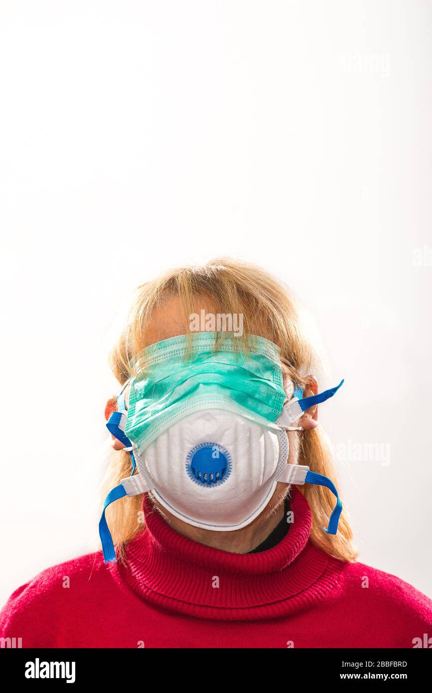Stop coronavirus, old afraid woman wears 2 medical masks all over her ...