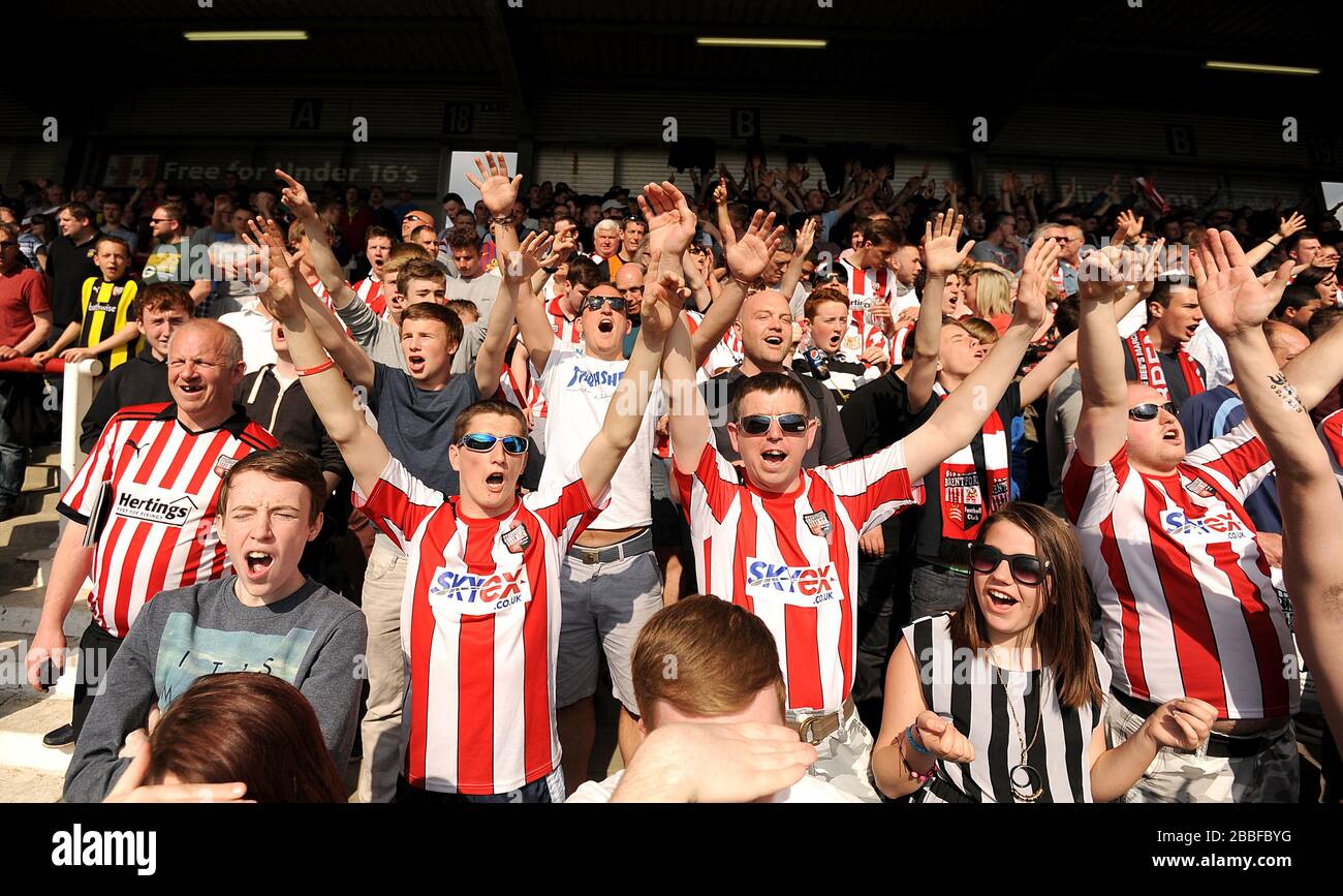 Brentford fans show their passion in the stands Stock Photo - Alamy
