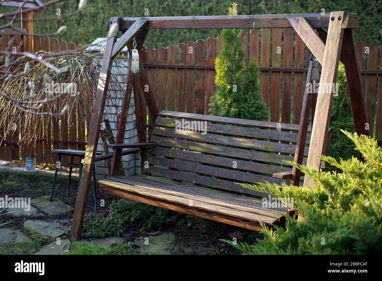 Old wooden swing hi-res stock photography and images - Alamy