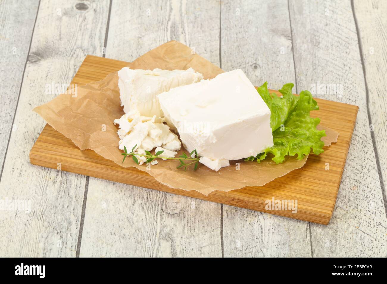 Greek traditional Feta soft cheese in the plate Stock Photo - Alamy