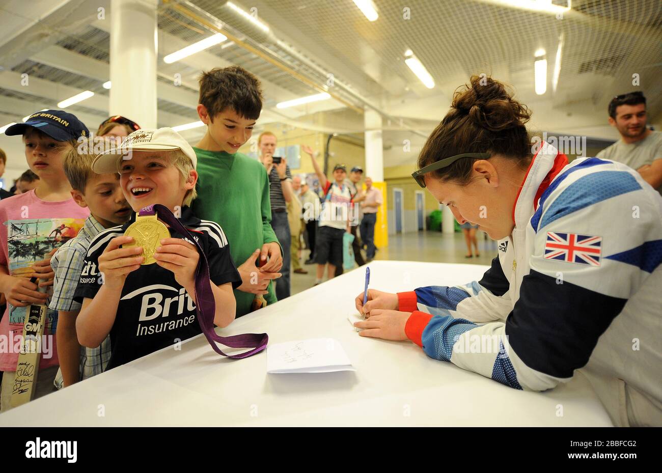 Olympic Gold Medalist, Sophie Hoskins signs autographs for fans Stock ...