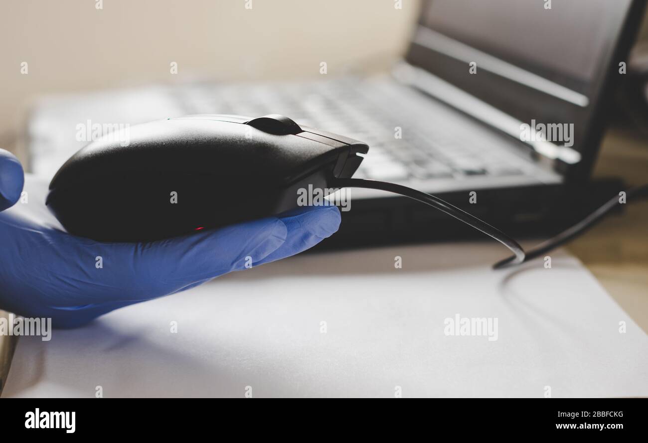 Man wearing rubber gloves hi-res stock photography and images - Alamy