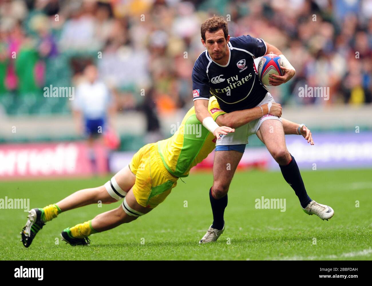 Usas zach test is tackled by australias con foley hi-res stock ...