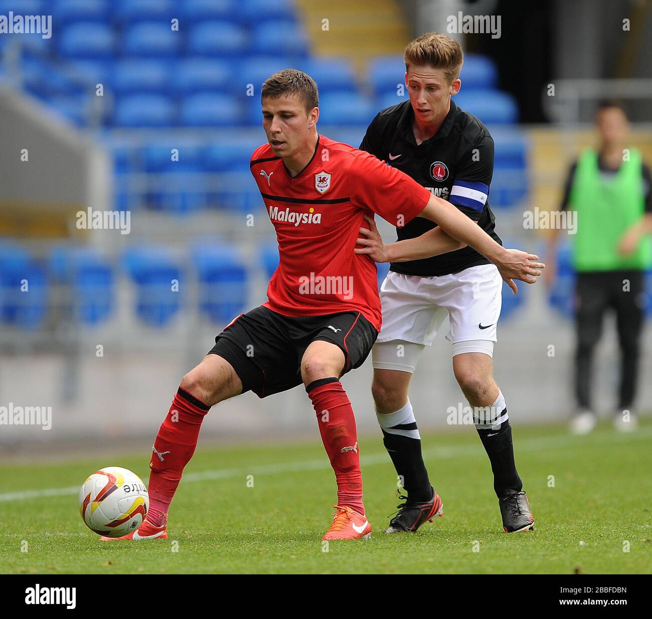 Cardiff City's Filip Kiss (left) and Charlton Athletic's Bradley Jordan ...