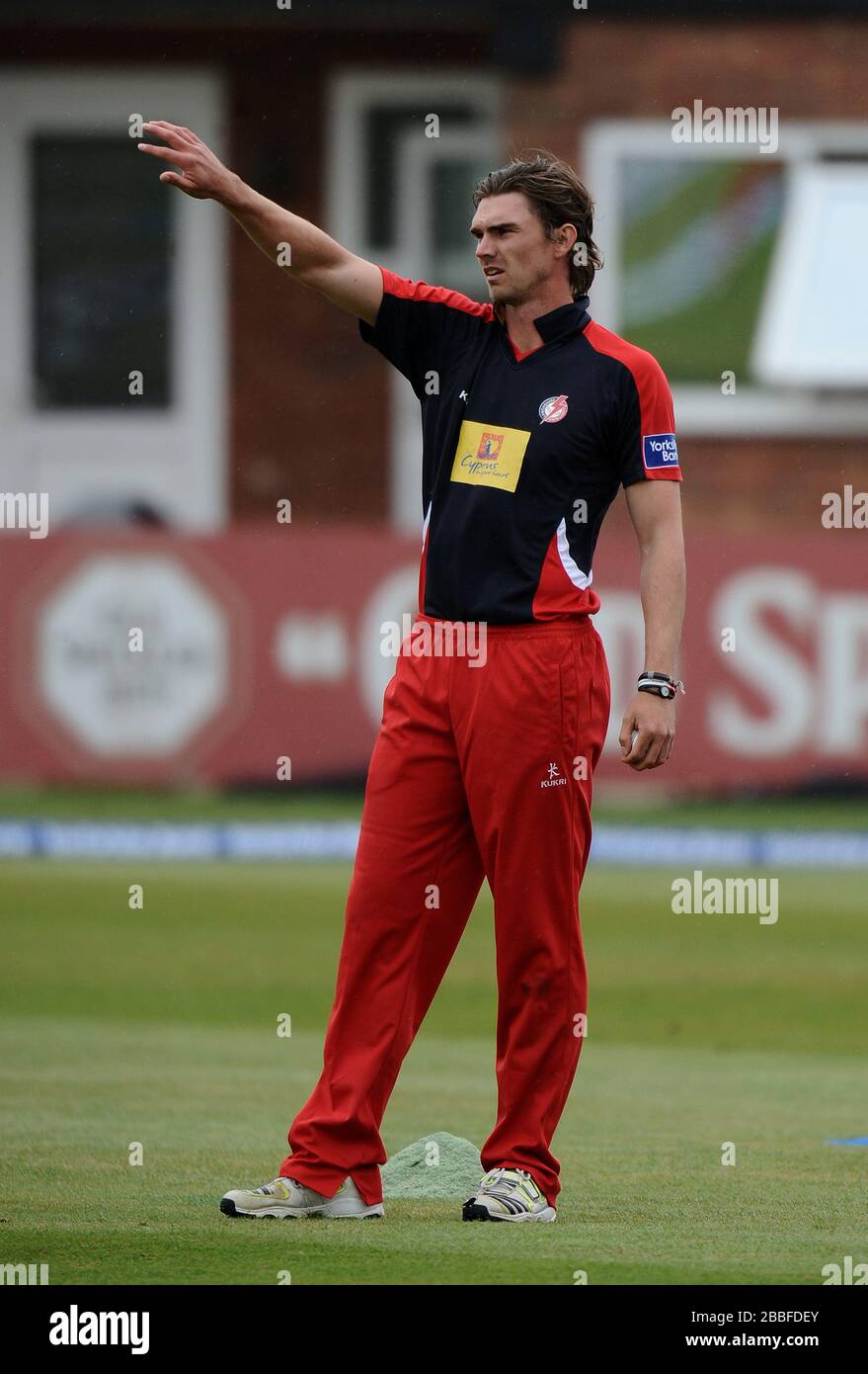 Lancashire's Oliver Newby sets the fielders before he bowls Stock Photo ...