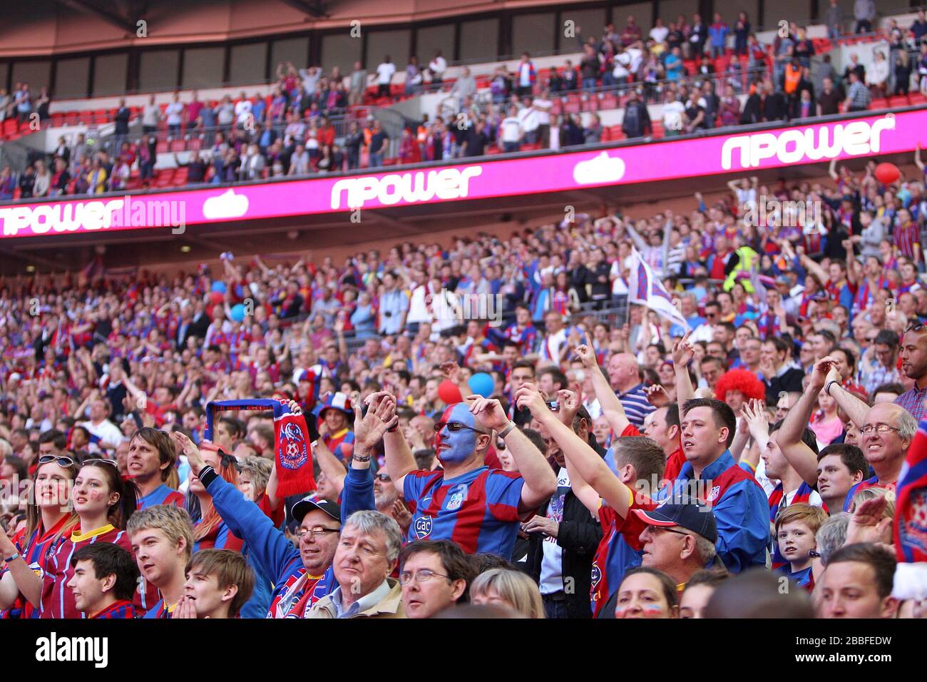 Crystal Palace fans celebrate in the stands as their team is promoted ...