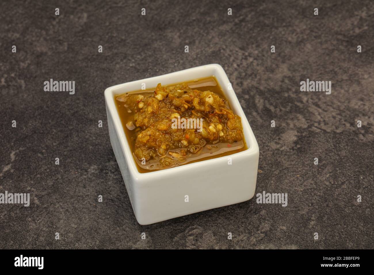 Green spicy sauce with pepper in the bowl Stock Photo - Alamy