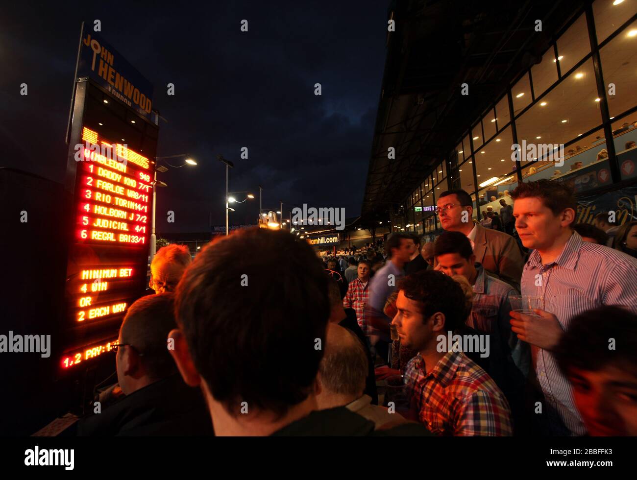 Bookmakers at work inside WImbledon Greyhound Stadium Stock Photo - Alamy
