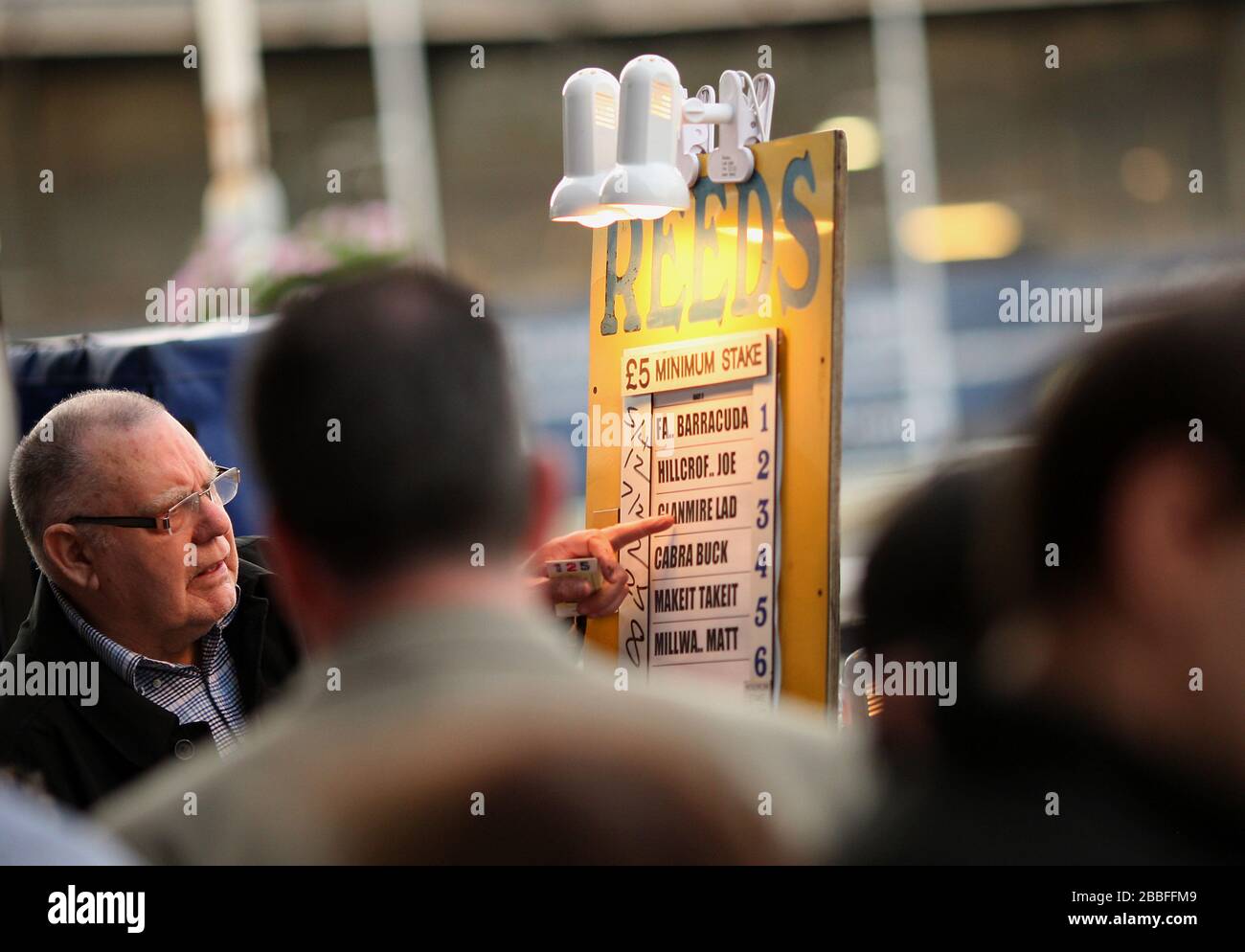 Bookmakers at work inside WImbledon Greyhound Stadium Stock Photo - Alamy