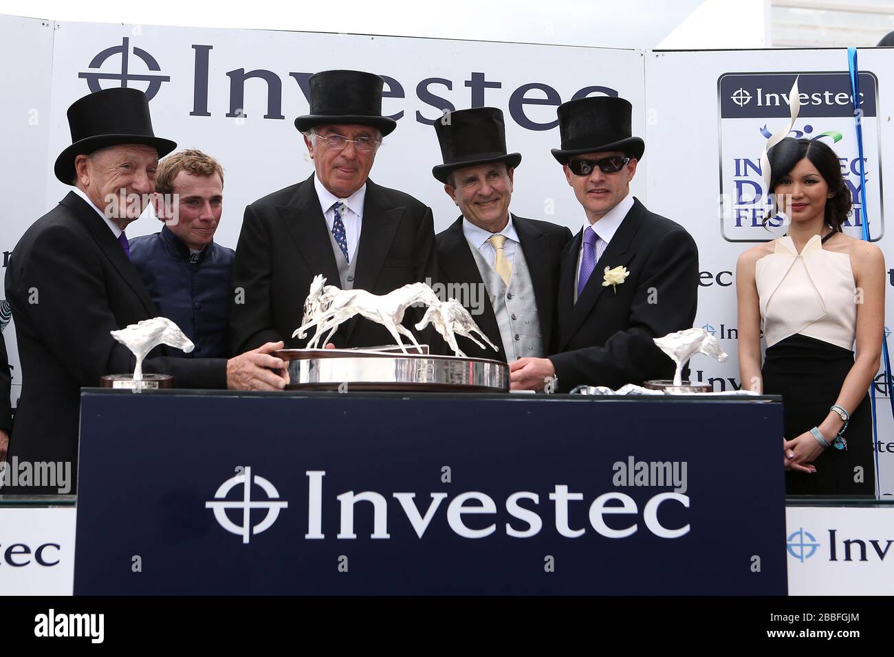(L to R) Ruler of the World owner Derrick Smith, jockey Ryan Moore ...