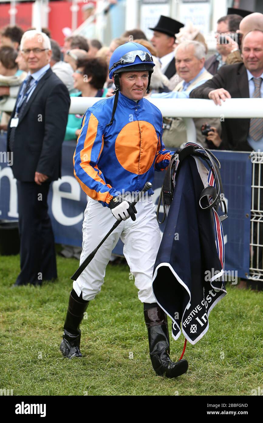 Jockey James Heffernan after his ride on Festive Cheer in the Investec ...