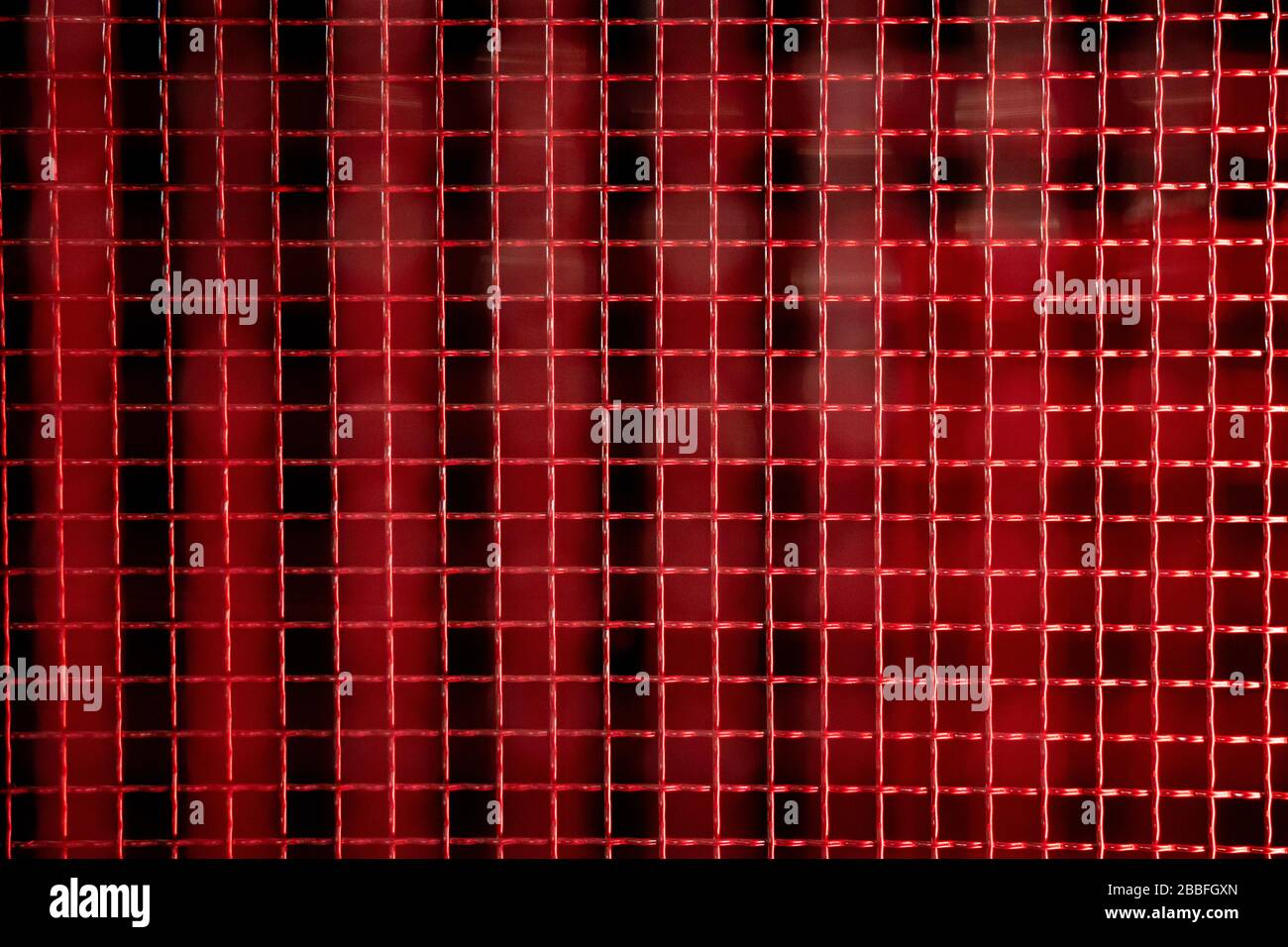 Red colored metal mesh background Stock Photo - Alamy