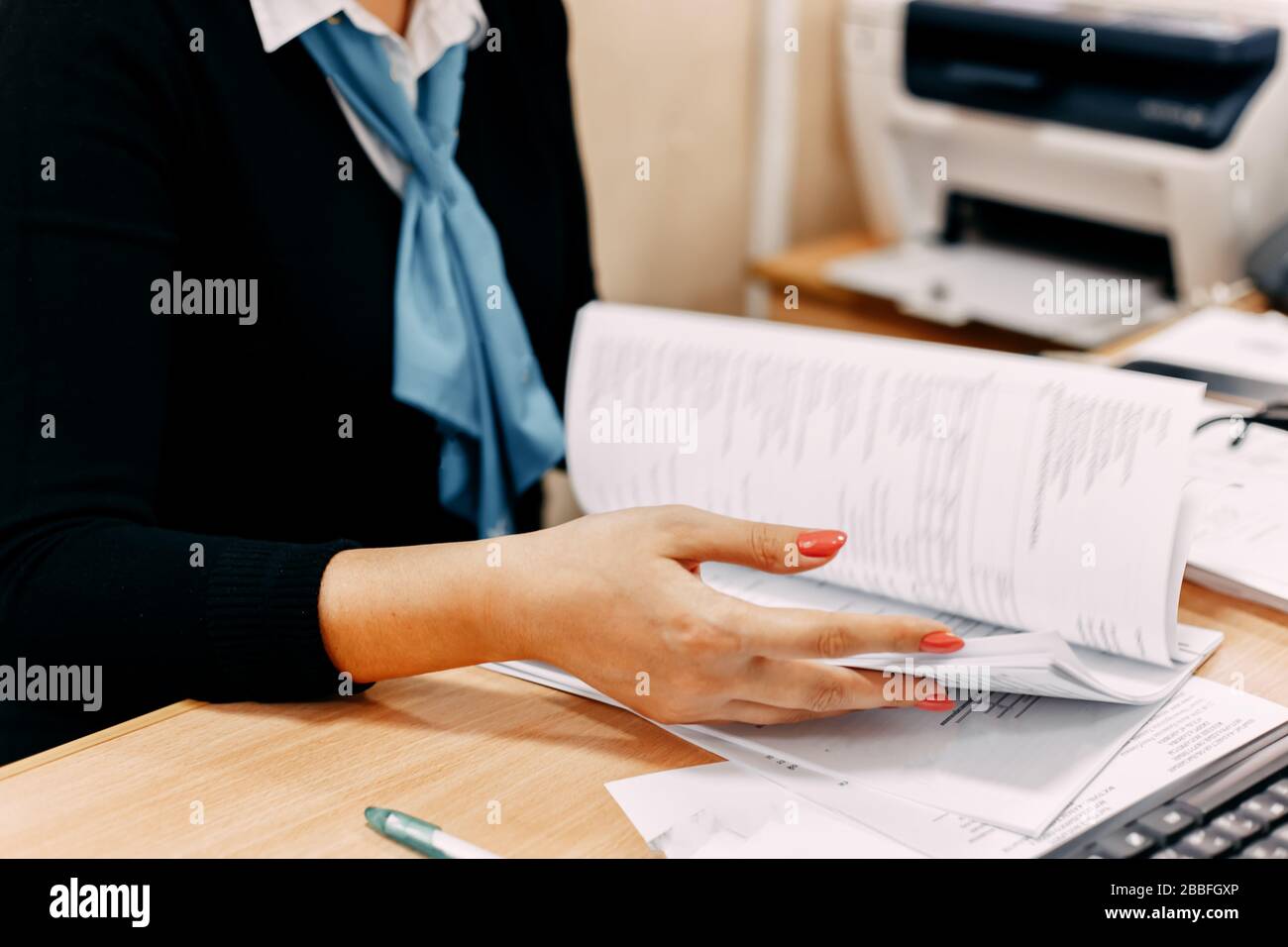 woman working with paper Stock Photo - Alamy