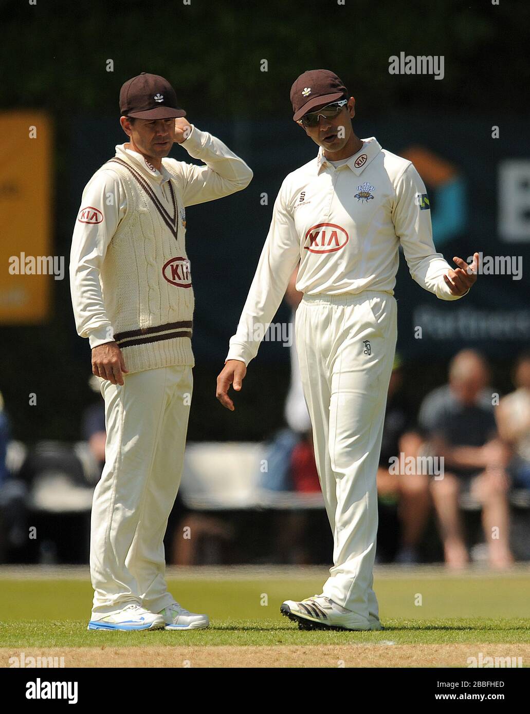 Surrey's captain Vikram Solanki chats with Ricky Ponting (left Stock ...