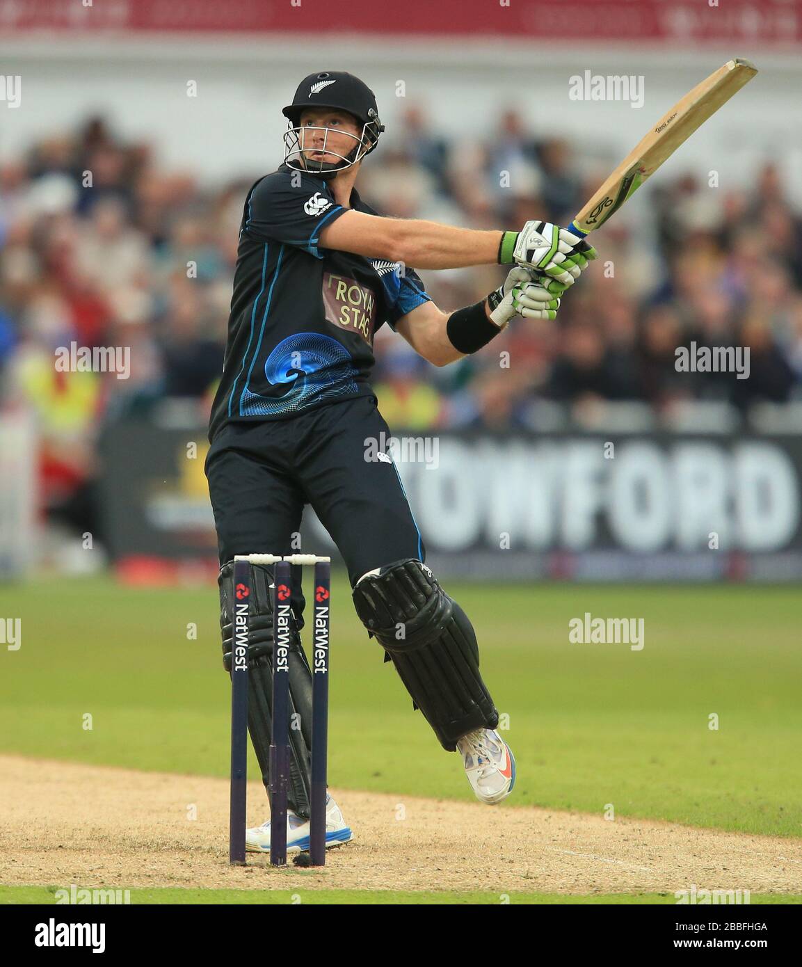 New Zealand's Martin Guptil hits the ball for six runs Stock Photo - Alamy