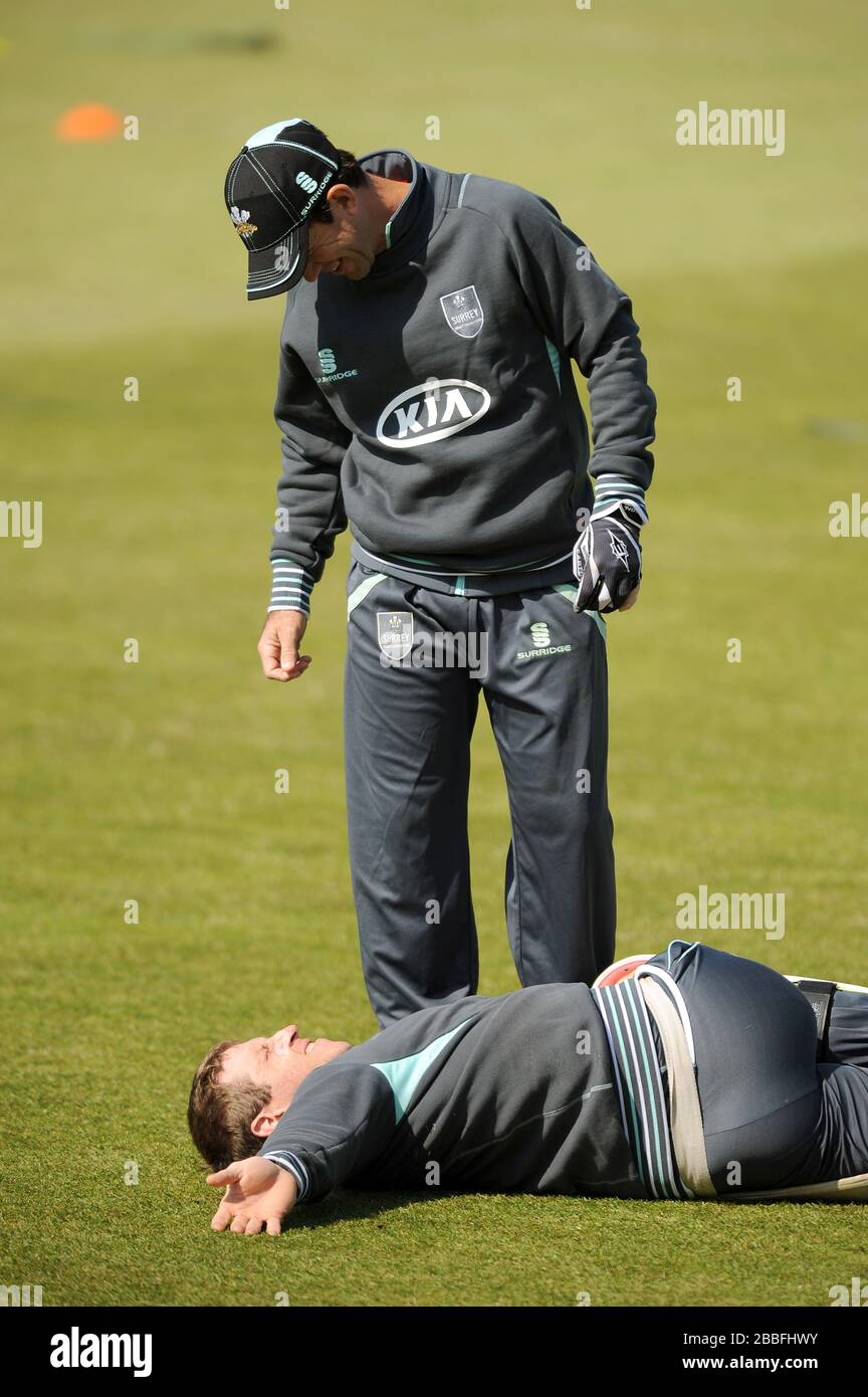 Surrey's Stuart Meaker and Ricky Ponting (stood) share a laugh during ...