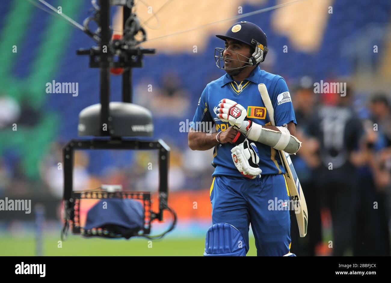 Sri Lanka's Mahela Jayawardene looks dejected as he leaves the field of ...