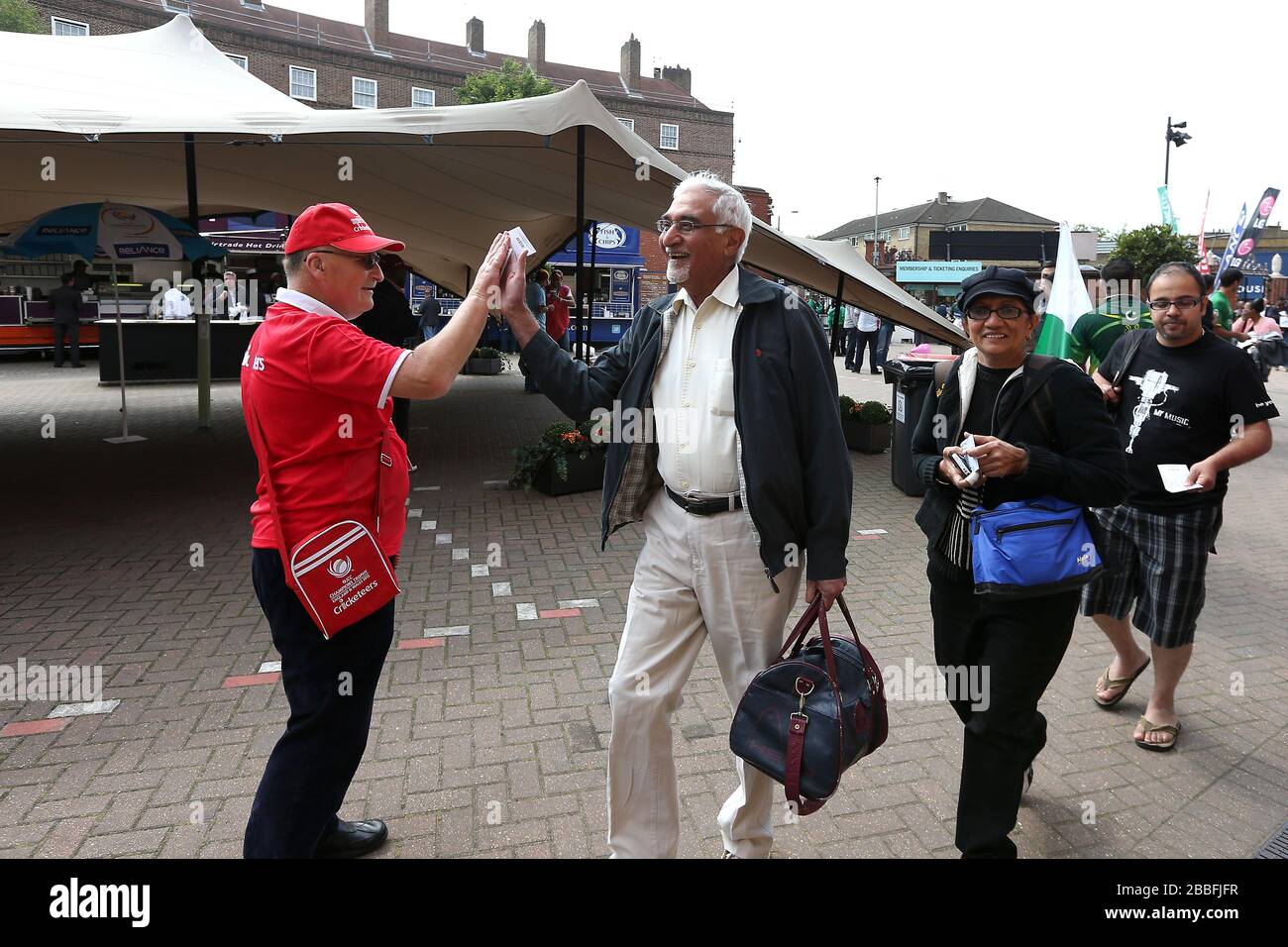 Staff member fans as they enter the kia oval hi-res stock photography ...