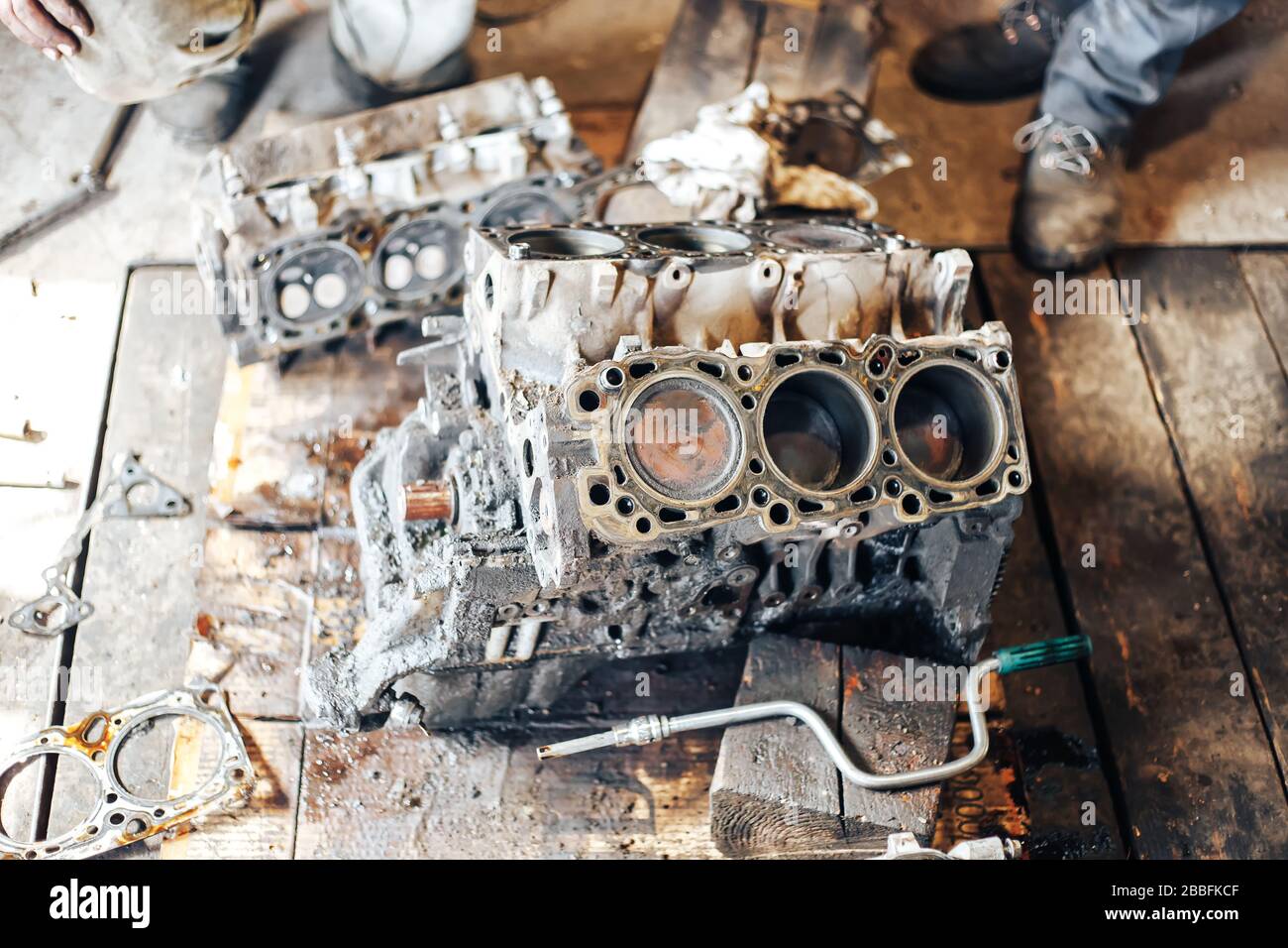 dirty auto engine in garage Stock Photo - Alamy