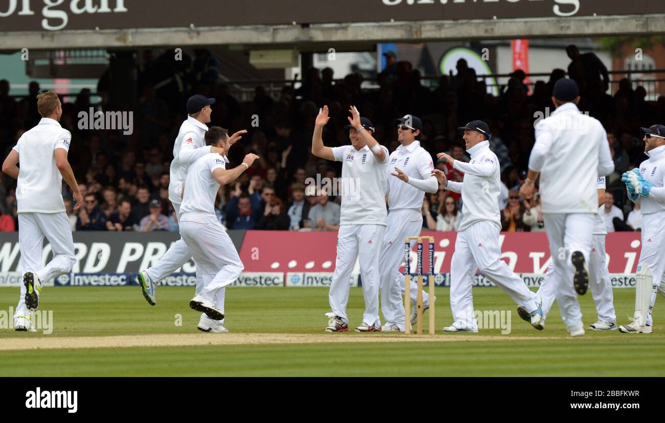England's James Anderson celebrates taking the wicket of New Zealand's ...