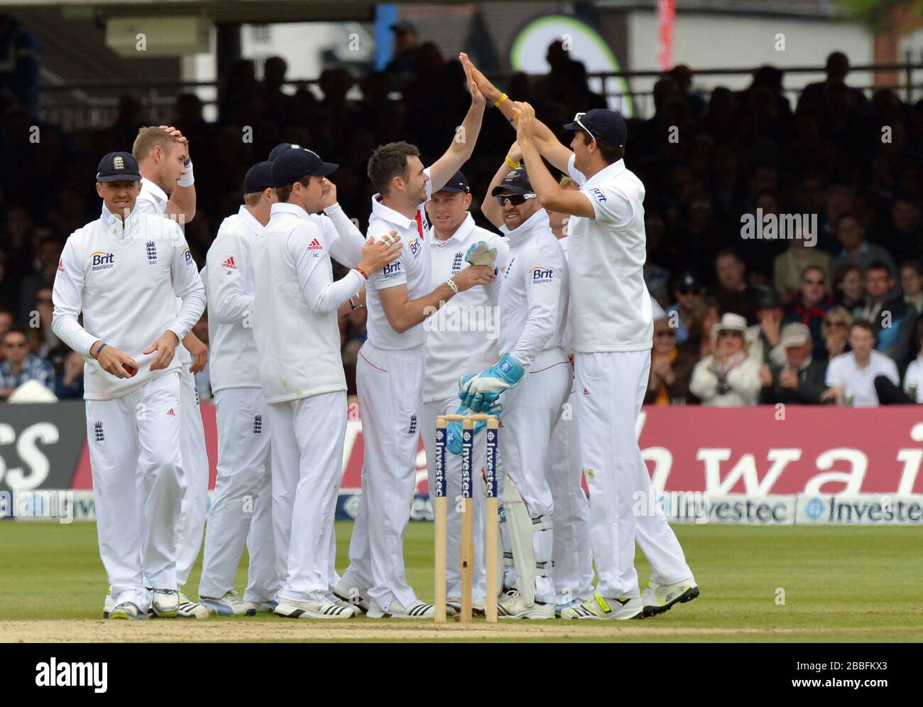 England's James Anderson celebrates taking the wicket of New Zealand's ...