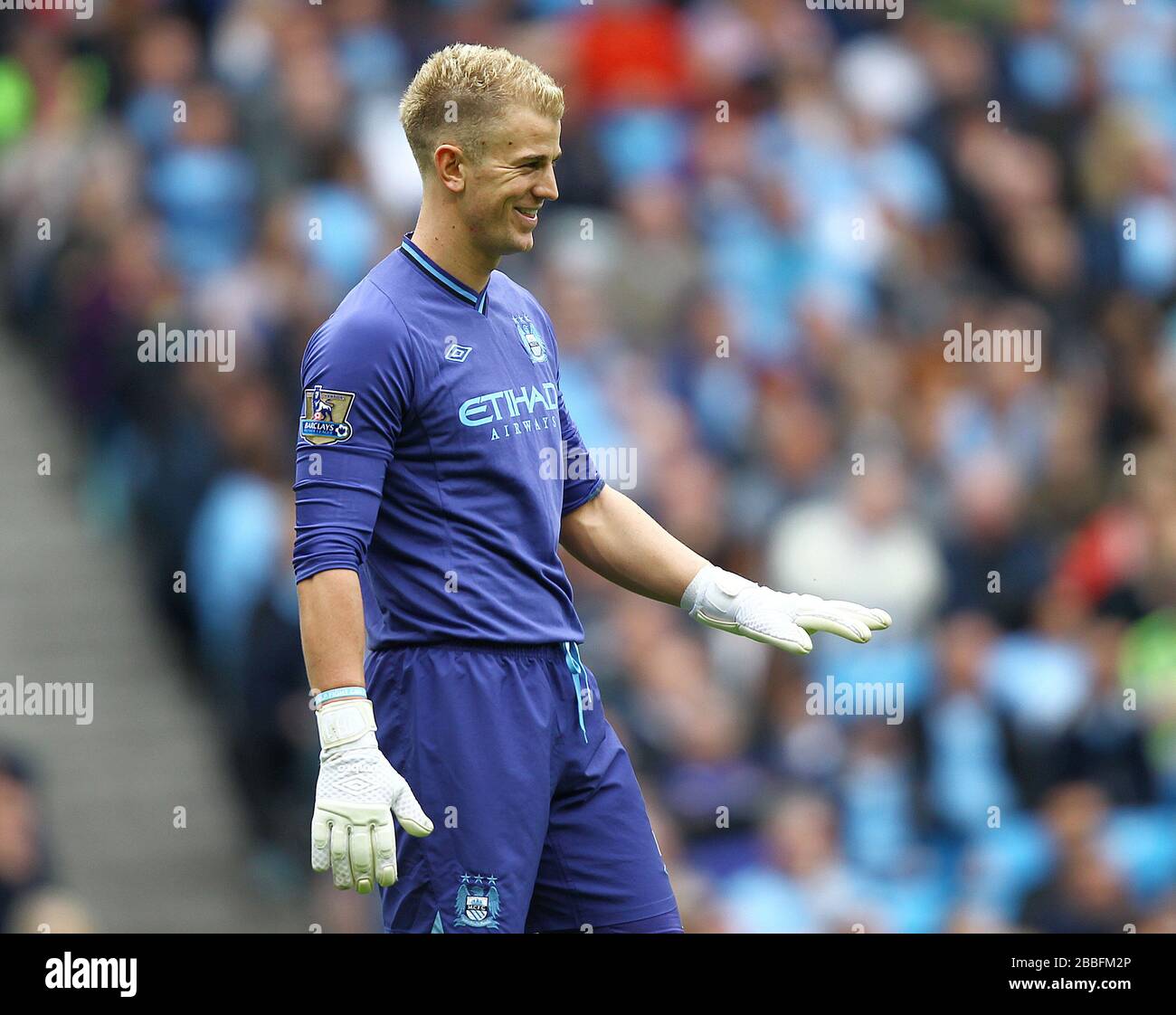 Manchester City's goal keeper Joe Hart looks happy during the game ...