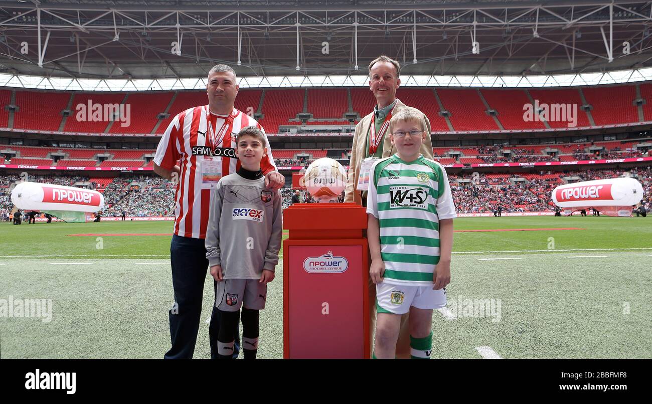 Matchday mascots pose for a photograph before kick off Stock Photo - Alamy