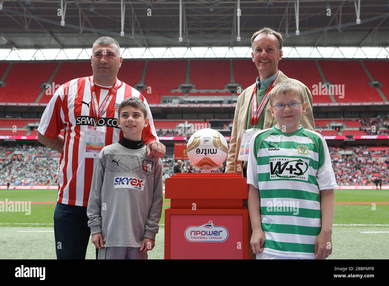 Matchday mascots pose for a photograph before kick off Stock Photo - Alamy