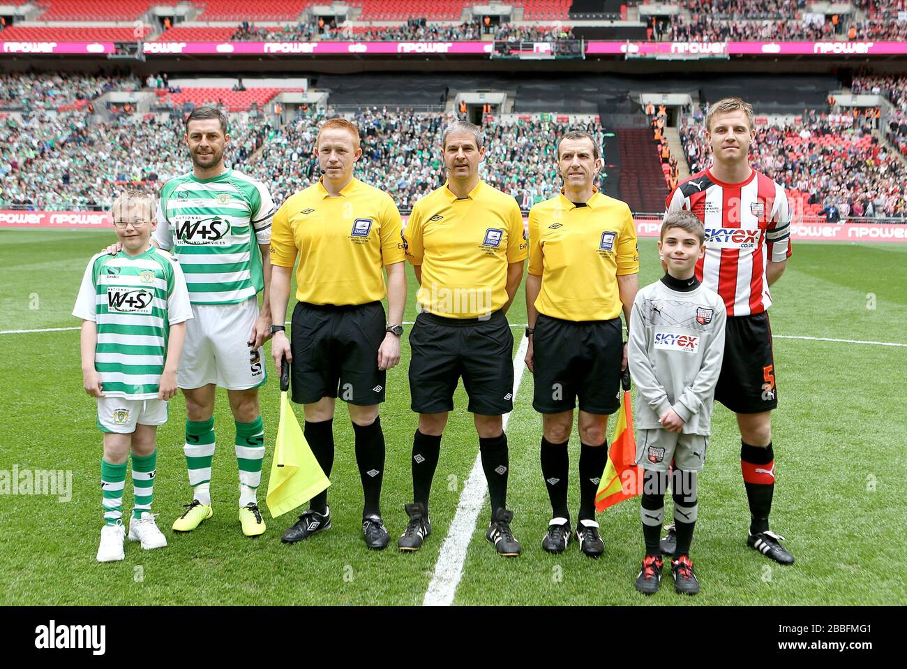 Match officials, team captains and mascots pose for a photograph on the ...