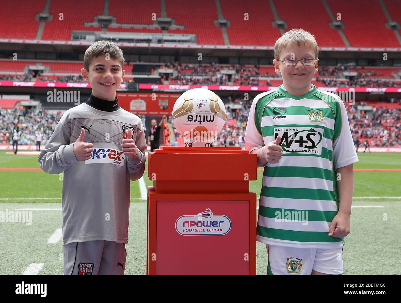 Matchday mascots pose for a photograph before kick off Stock Photo - Alamy