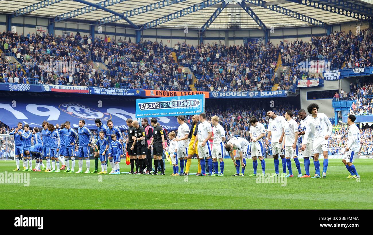 Players from both teams line up before kick off hi-res stock ...
