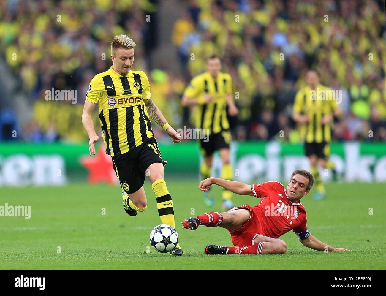 Borussia Dortmund's Marco Reus (left) and Bayern Munich's Philipp Lahm ...