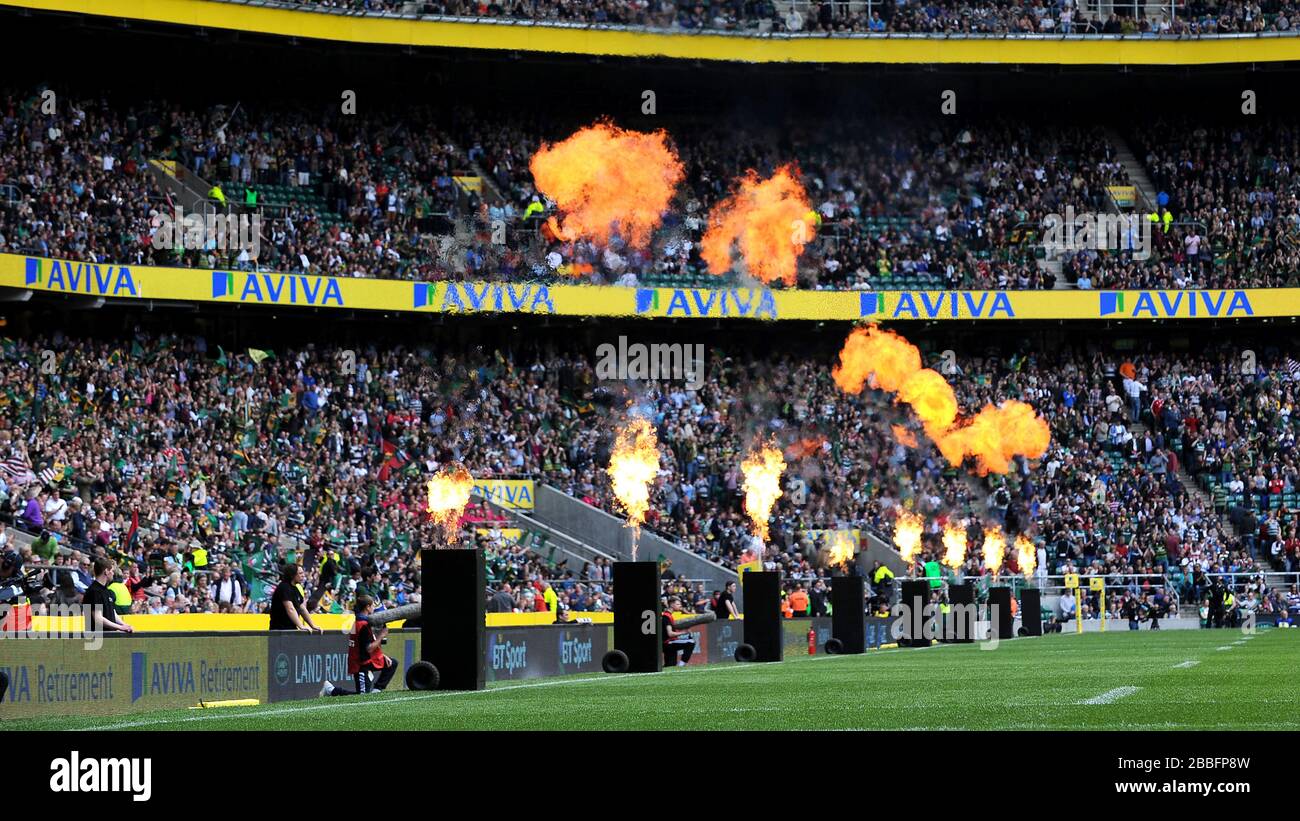 Flames are set off as the teams prepare to walk on to the pitch before ...