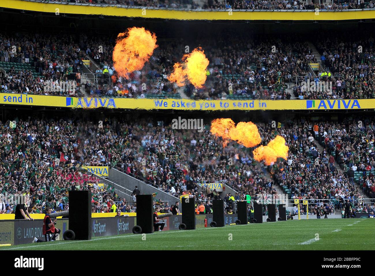 Flames are set off as the teams prepare to walk on to the pitch before ...