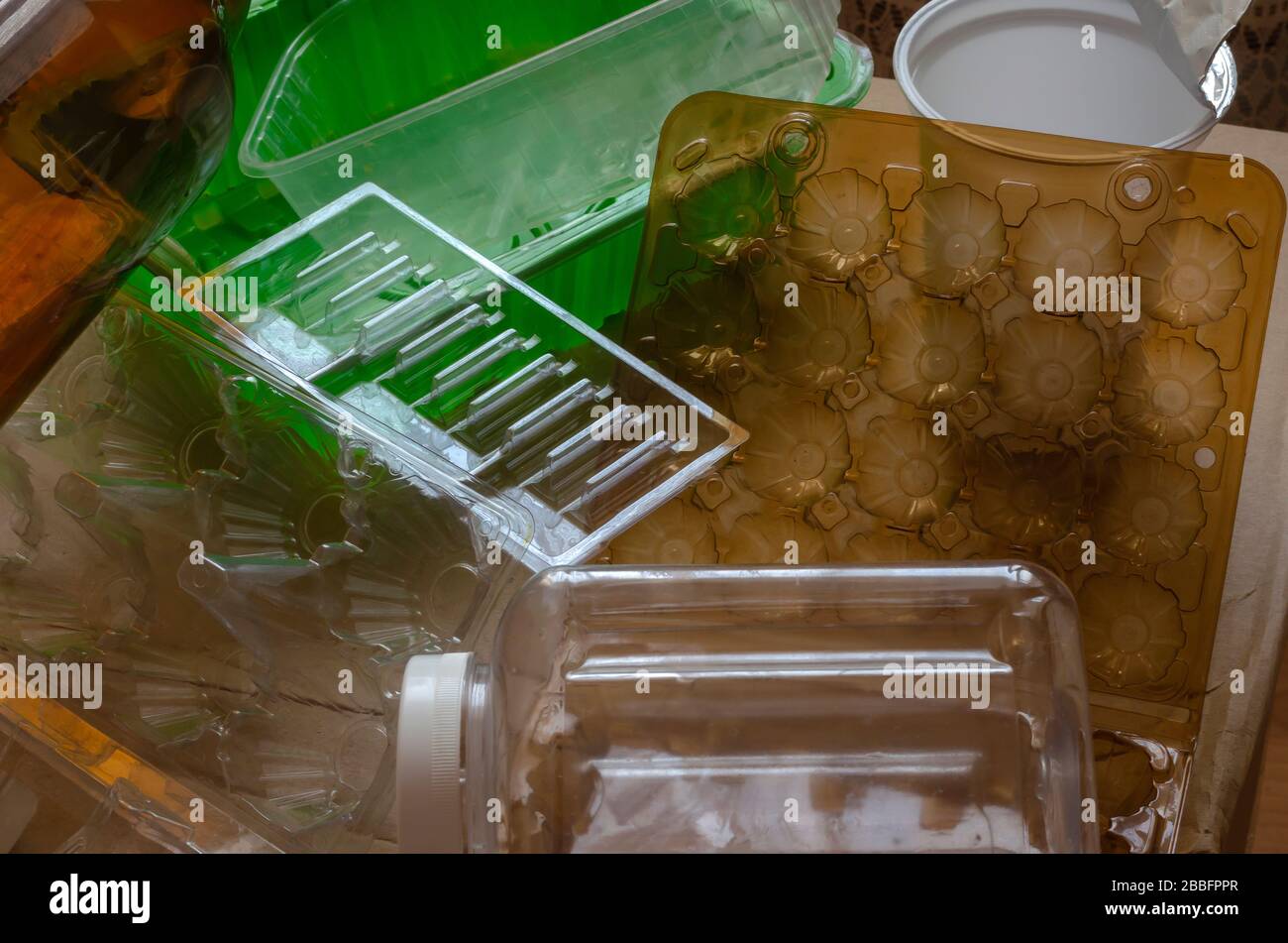 Household plastic waste background. Various plastic products. Sort ...