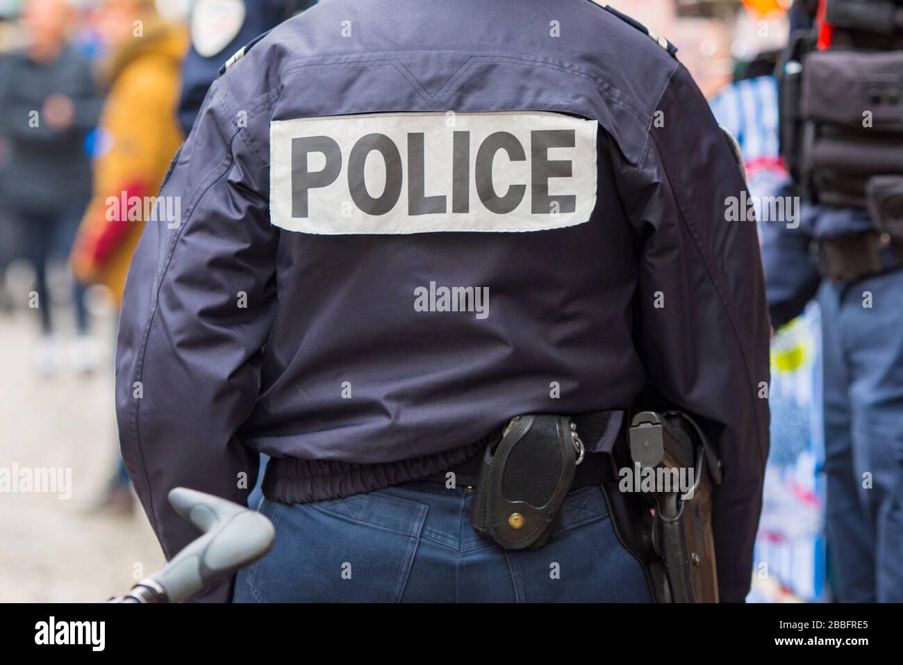 France, back of police officer in Paris Stock Photo - Alamy