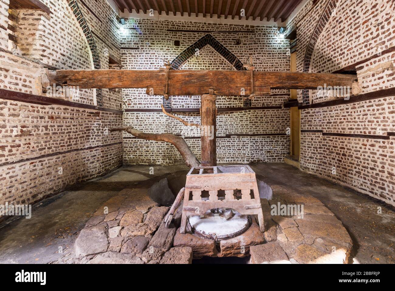 Front view of ancient rotary Flour Mill used to be rotated by animal ...