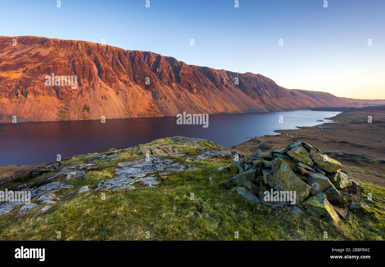 Illgill Head, also known as The Screes, glows red in the last light of ...