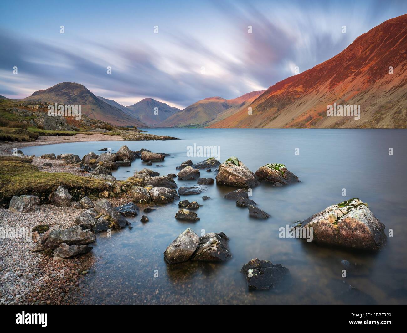 Illgill Head, also known as The Screes, glows red in the last light of ...