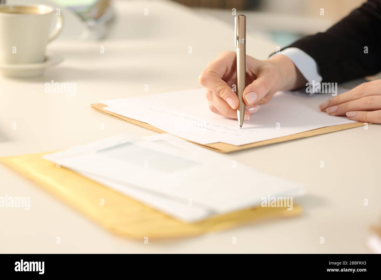 Woman writing letter hi-res stock photography and images - Alamy
