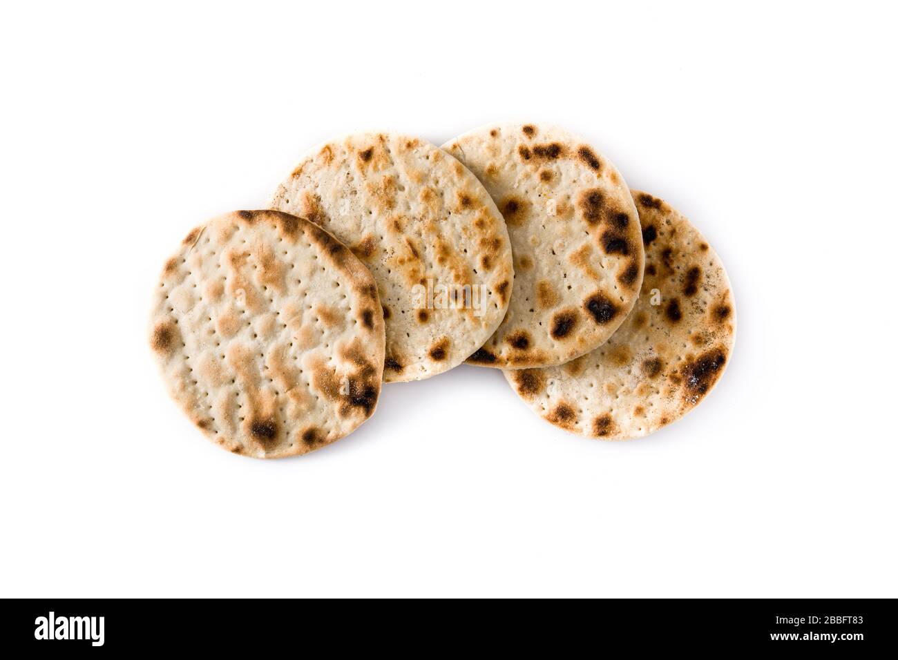 Handmade matzah for Jewish Passover isolated on white background. Top ...