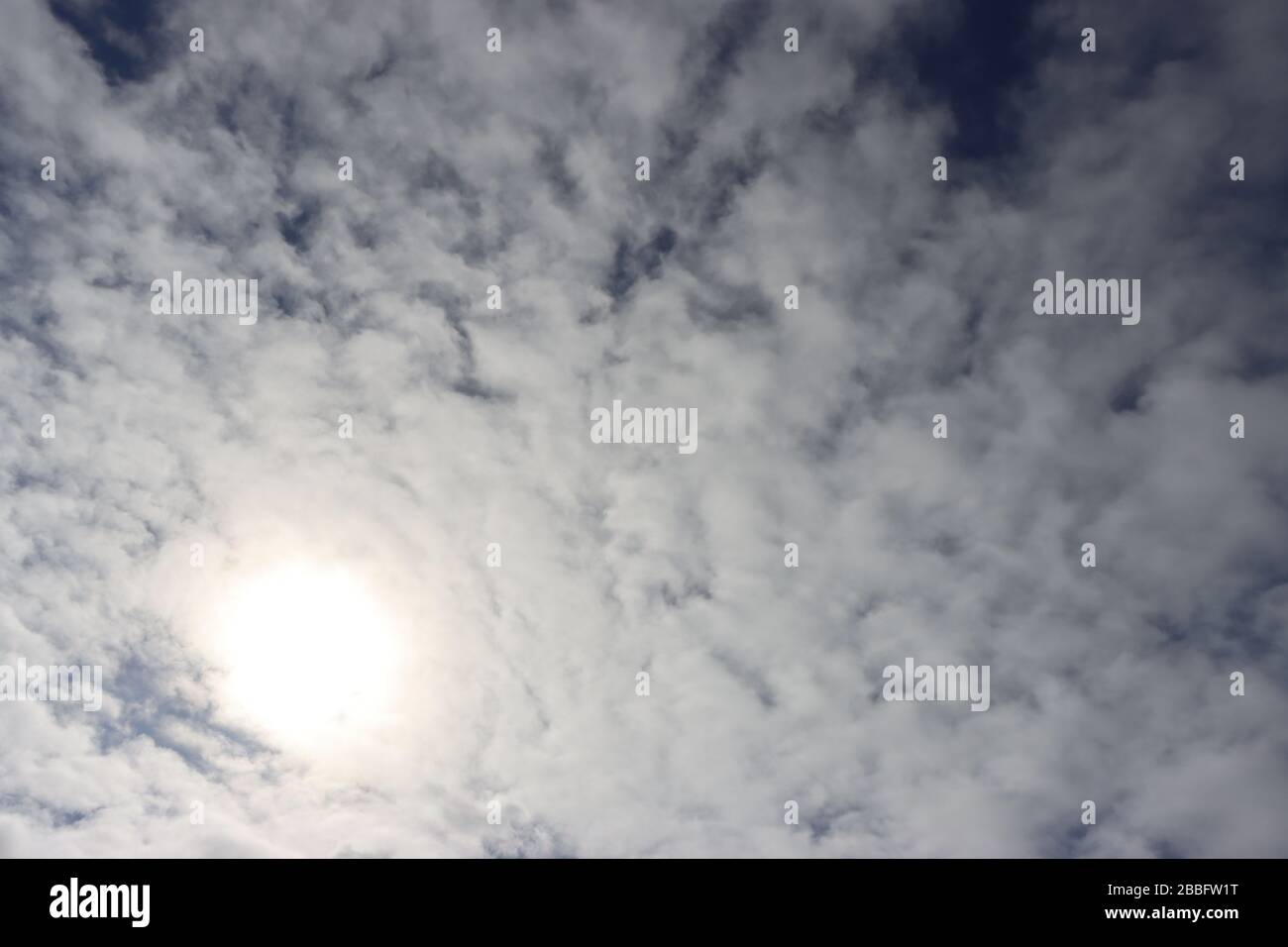 Sun Covered in Clouds Stock Photo - Alamy