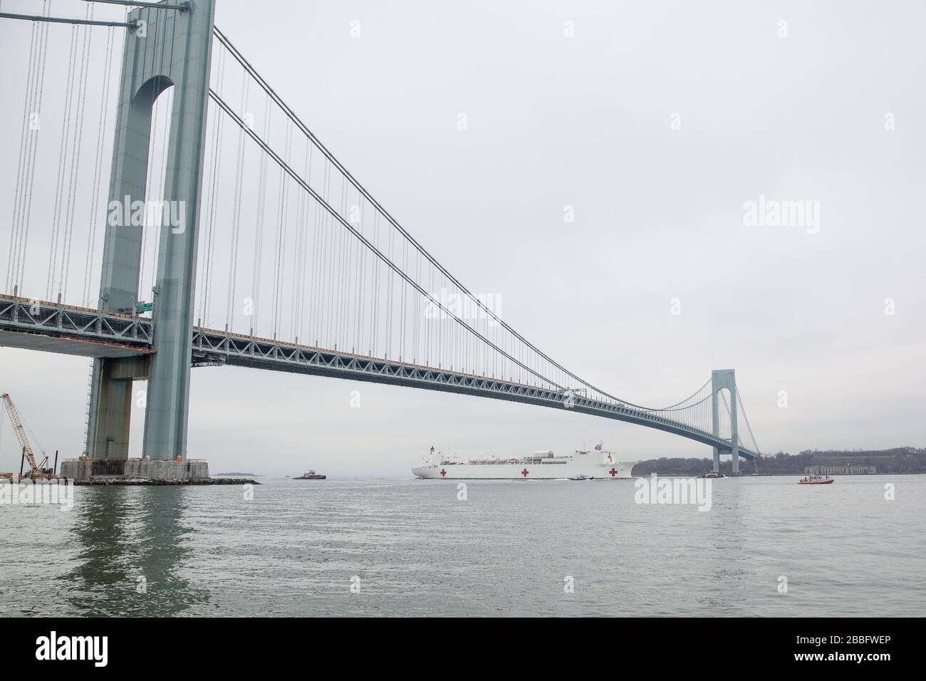 USNS Comfort crosses under the Verrazzano Bridge in Brooklyn out and ...