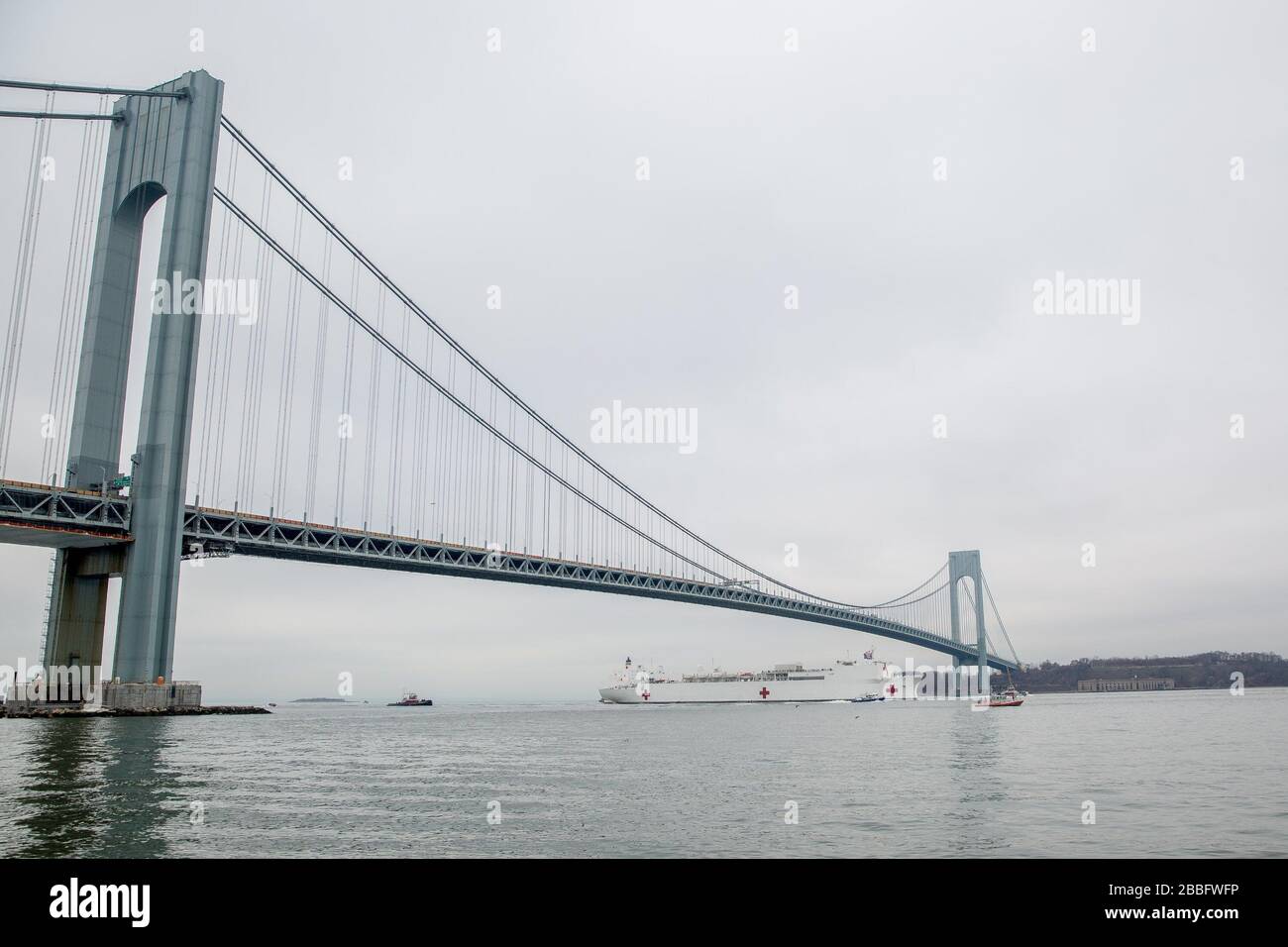 USNS Comfort crosses under the Verrazzano Bridge in Brooklyn out and ...