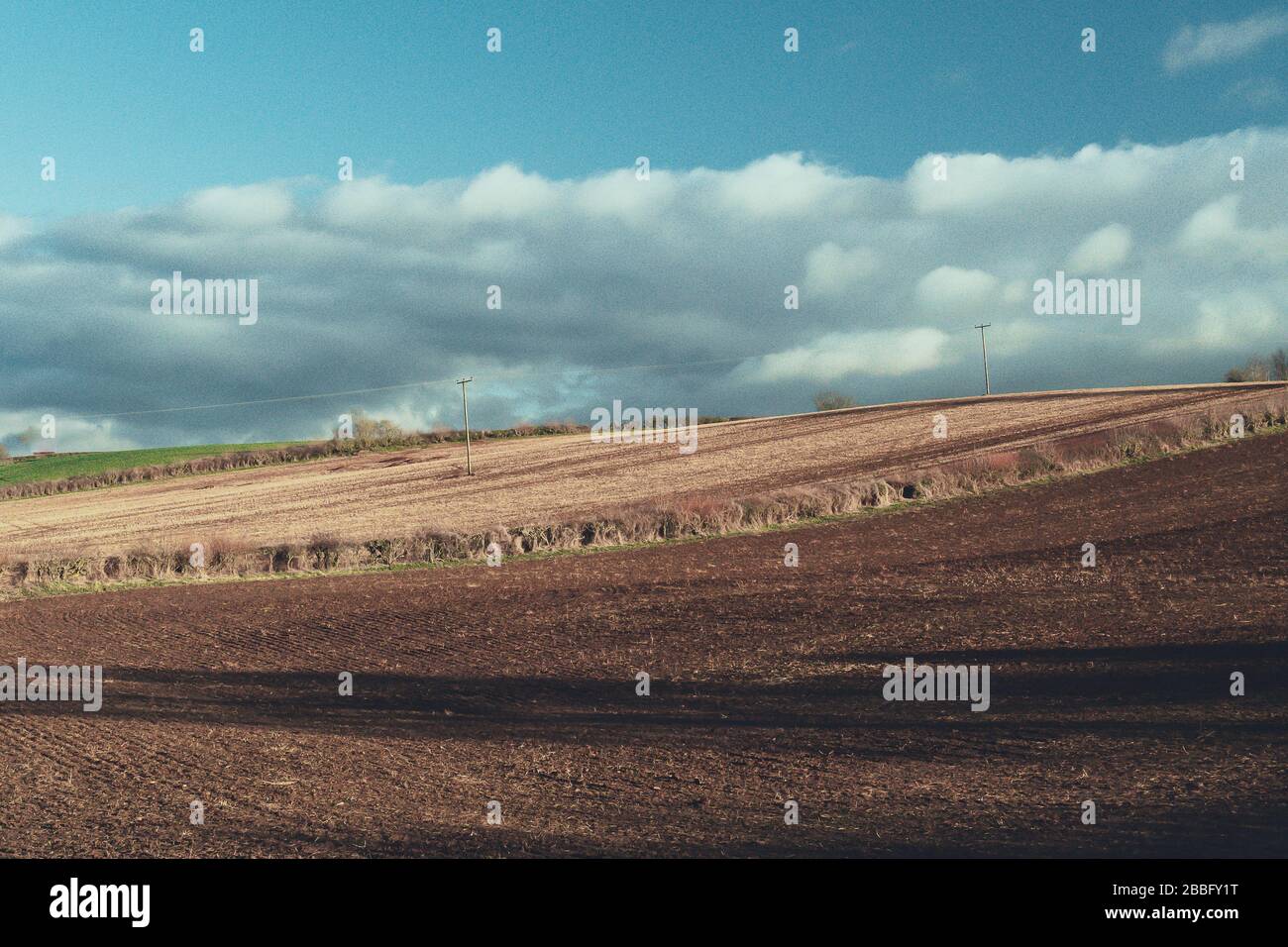 Undulating fields on sunny hi-res stock photography and images - Alamy