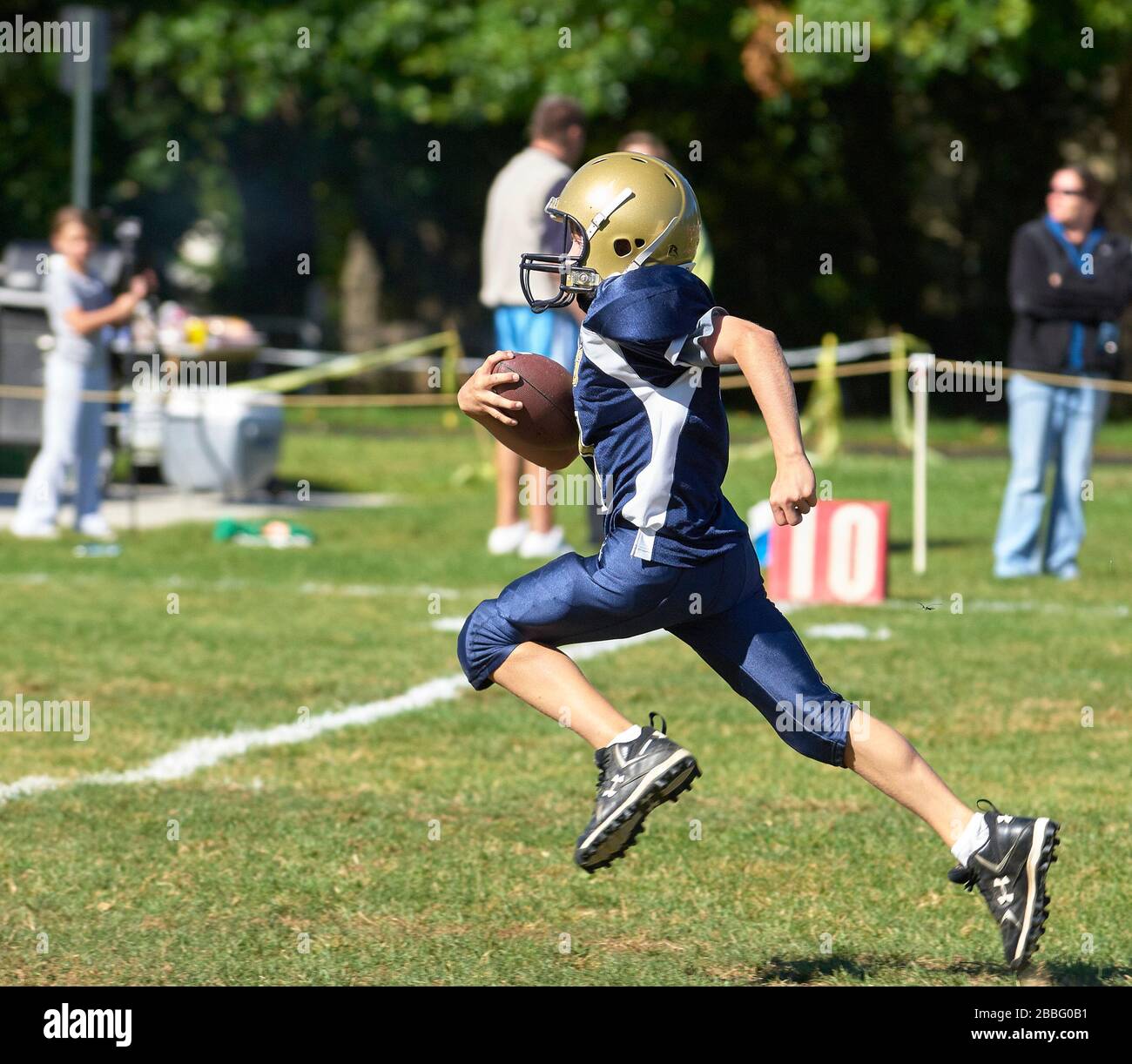 Youth football during after school team play competition Stock Photo ...