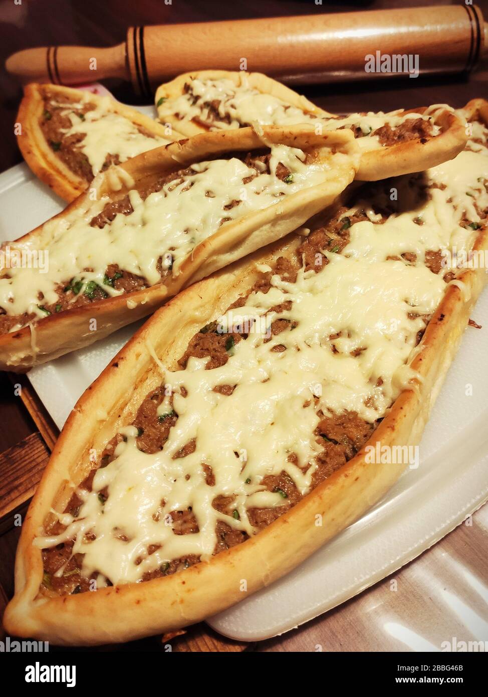 Turkish Traditional Pide with ground beef, onion, tomato and pepper ...