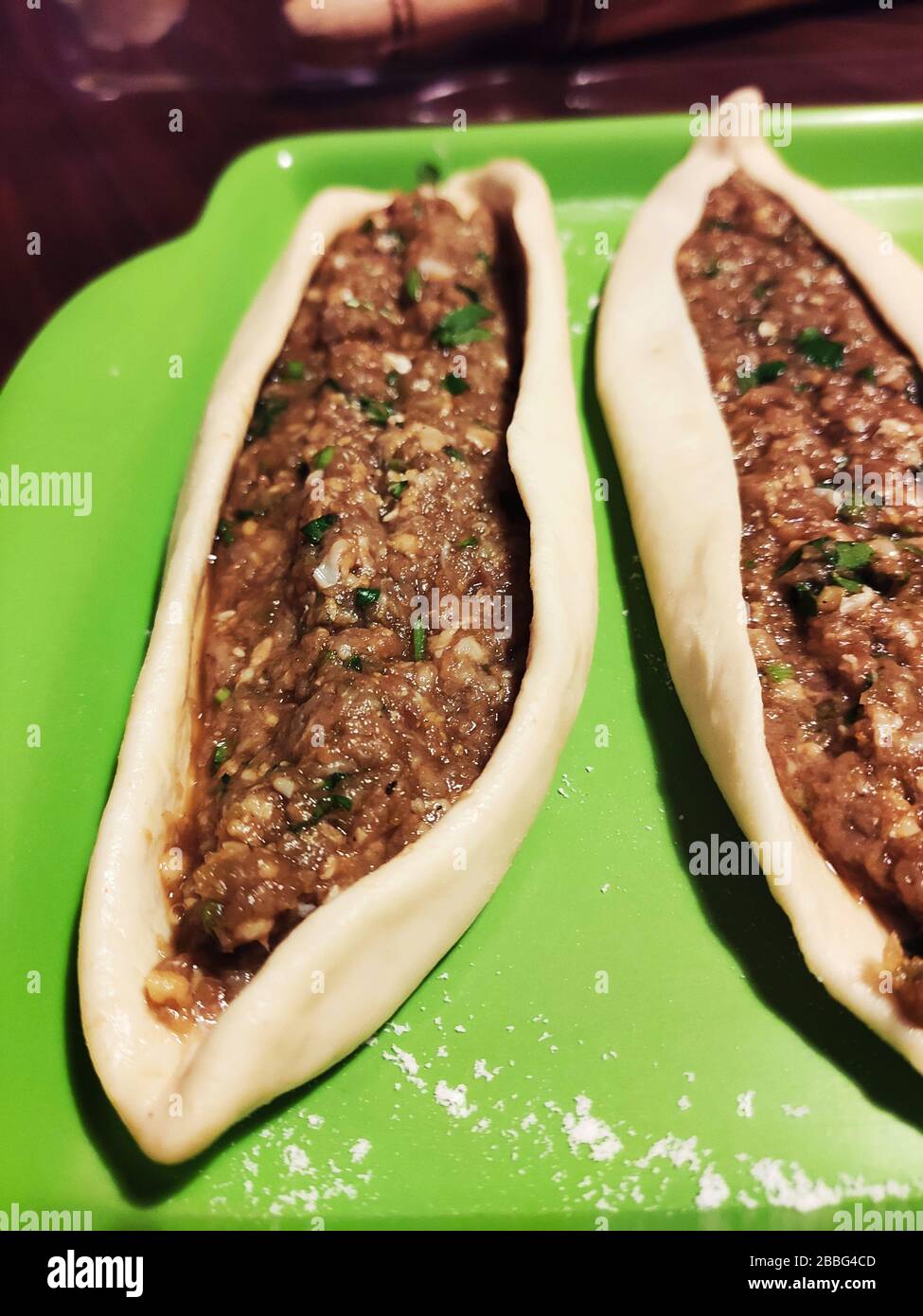 Turkish Traditional Pide with ground beef, onion, tomato and pepper ...