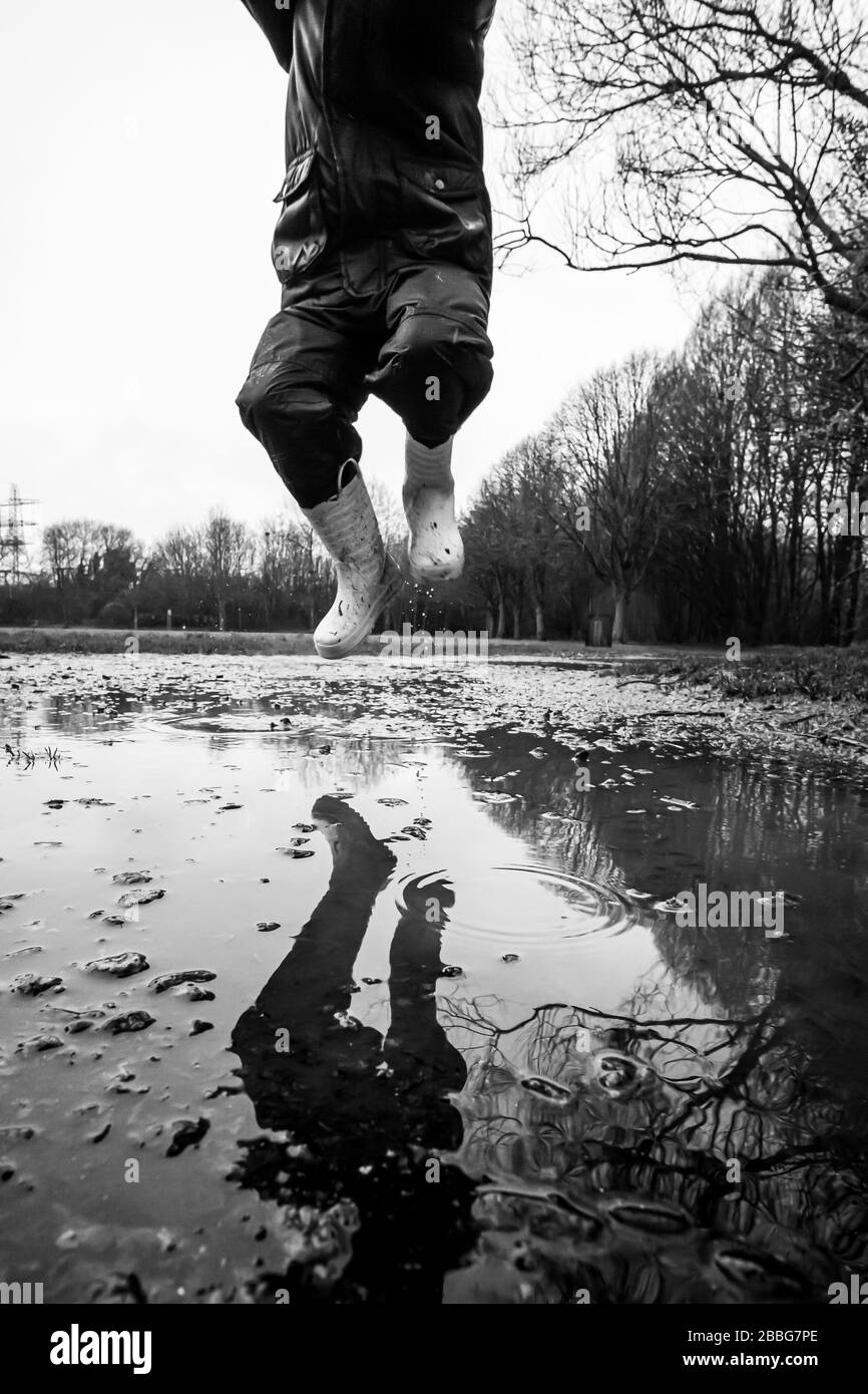 Kids Wellies Puddles High Resolution Stock Photography and Images - Alamy